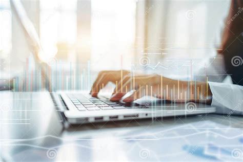 Hands Typing On A Laptop Keyboard With Overlaid Graphs Representing
