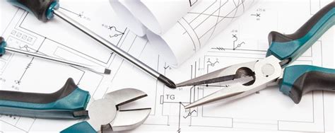 Premium Photo Metal Pliers Screwdriver And Diagrams Of Housing Plan