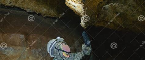 Scientist Exploring Of Cave For Geology Science Professional