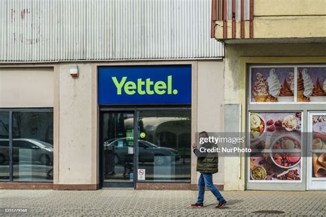 Man Walking In Front Of Yettel Phone Sales Room Is Seen In News