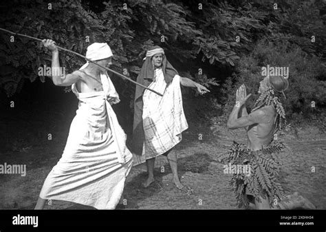 Three Young Men In Disguise Performing A Play On The Edge Of A Forest [automated Translation
