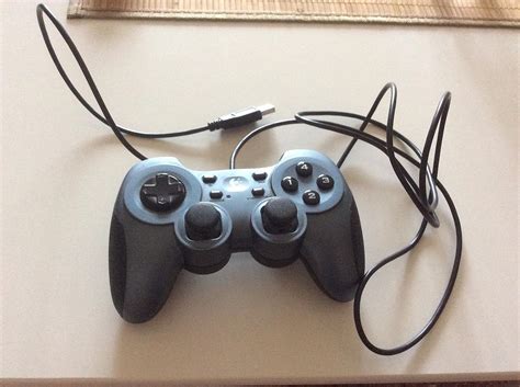 Logitech Rumblepad 2 Vibration Feedback Gamepad - Volante/mando (PC ...