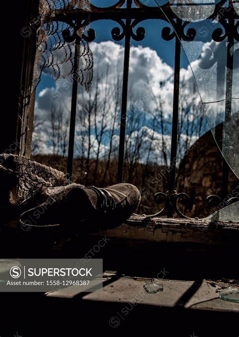 Broken Cellar Window Superstock