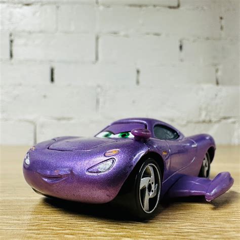 Disney Pixar Cars 2 Holley Shiftwell With Spy Wings Purple Diecast Car