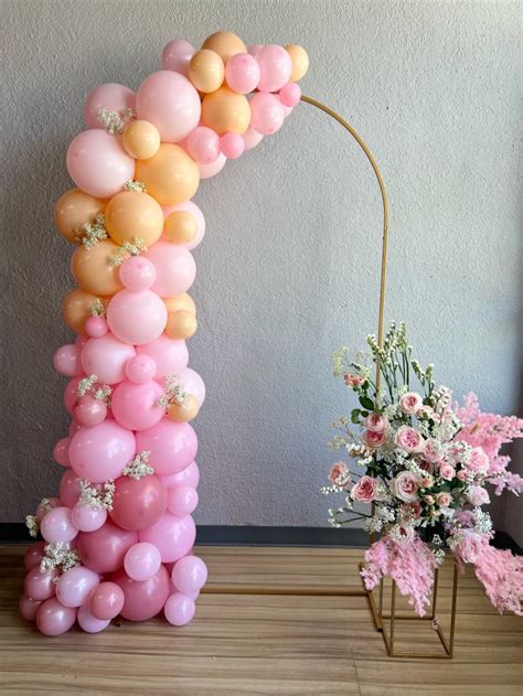 Candy Balloon Semi Arch With Flower Arrangement