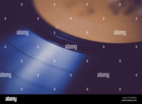 an abstract view of a vintage record creates a unique background stock