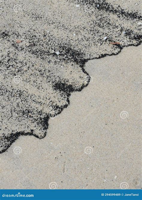 Dark Tide Mark On Dull Sandy Beach With Space For Copy Stock Image