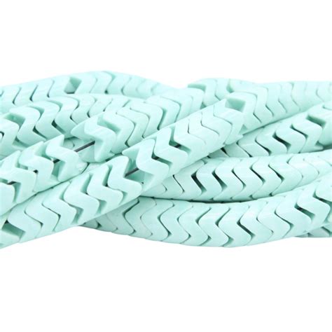 Hematite 10mm Snake Bead Pastel Green 40cm Strand Bead