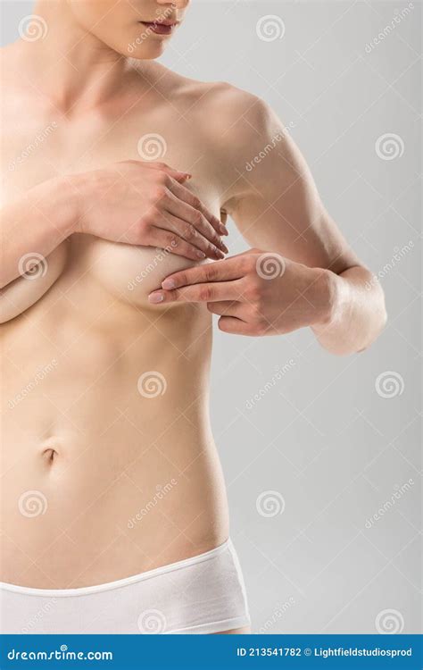 Partial View Of Naked Girl Covering Breast Isolated On Grey Stock Photo Image Of Medicare