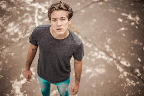 Premium Photo High Angle Portrait Of Young Man Standing Outdoors