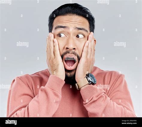 Wow Surprise And Indian Man With Hands On Face In Shock Omg And Deal