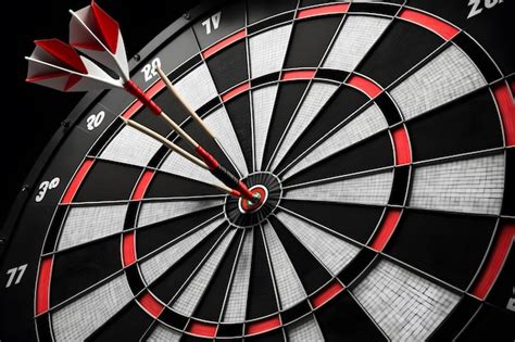 Premium Ai Image The Darts Isolated On Black Background Neural Network Ai Generated