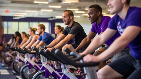 Premium Ai Image A Photo Of A Cycling Class With Energetic Instructors