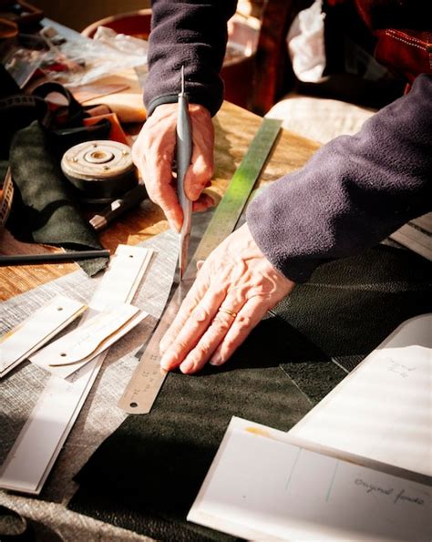 Premium Photo Midsection Of Man Working On Table In Workshop