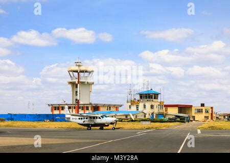 Safarilink Aircraft Taxiing By The Control Tower At Wilson Airport The