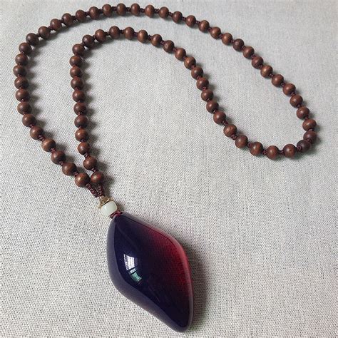 二代血珀吊坠项链毛衣链短款时尚女简约百搭秋冬季衣服装饰品挂件虎窝淘