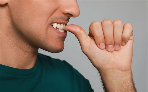 Effects Of Nail Biting On Teeth Tips From A Dentist