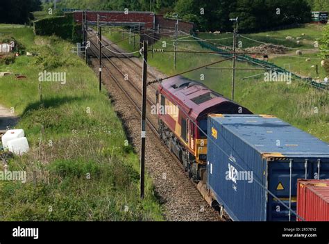 Class 66 Diesel Electric Shed Locomotive On Container Train On West