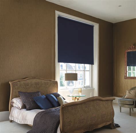 Blue Roller Blinds In Gold Bedroom