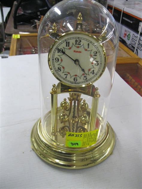 Kundo Brass And Glass Dome Clock