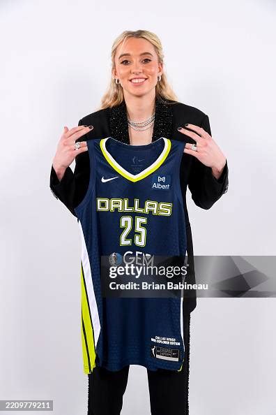 Paige Bueckers Poses For A Portrait After Being Drafted By The Dallas