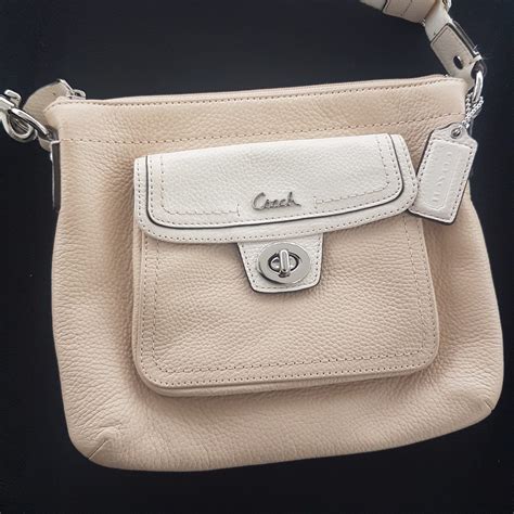 Beige Leather Coach Purse With Front Pocket