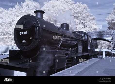 Hall Class Steam Engine 53808 Being Coupled To The Front Of A Passenger Train At Bishops Lydeard