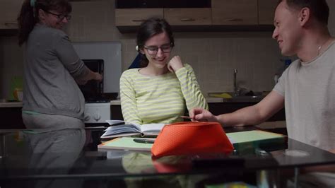 10 Dad Helps Daughter With Homework After Dinner Stock Videos And