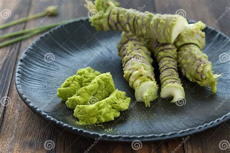 Japanese Wasabi Paste On Wooden Table Fresh Root Of Wasabi Plant Healthy Snack Tasty