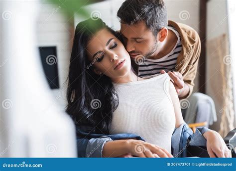 Kissing Breast Couple