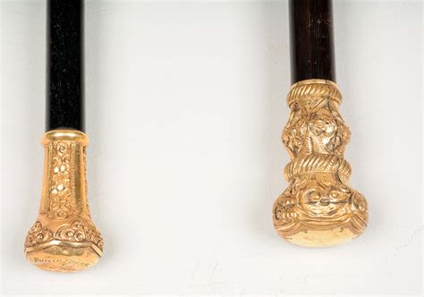 Lot Detail Lot Of 2 Canes With Ornate Knobs