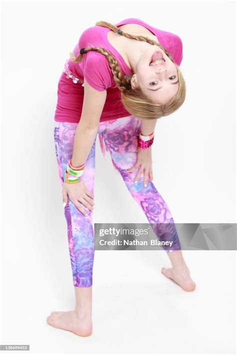 Teenage Girl Bending Over Backwards Foto De Stock Getty Images