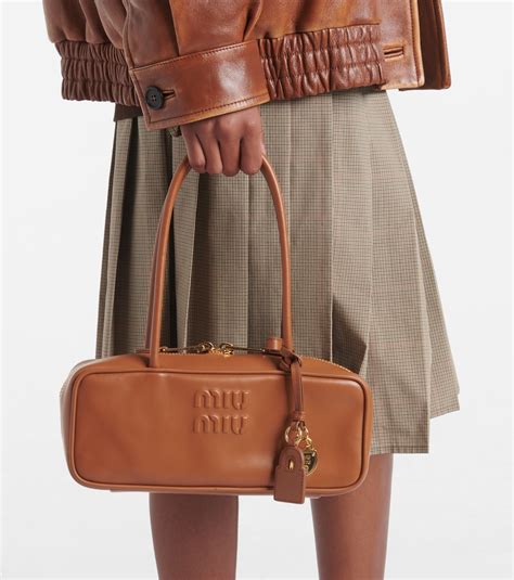 Beau Logo Embossed Leather Tote Bag In Brown Miu Miu Mytheresa