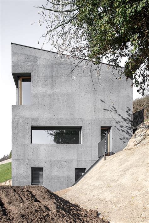 Andreas Gruber Embeds Minimal Concrete House Into The Italian Hillside