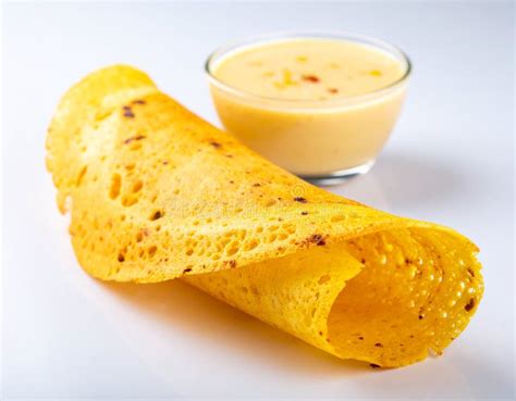 Crispy Thin Dosa Paired With Rich Creamy Semiya Kheer In A Vibrant Side Angle Shot Stock