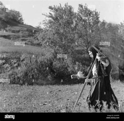 Romanian Peasant Measuring The Land With An Old Wooden Compass Stock