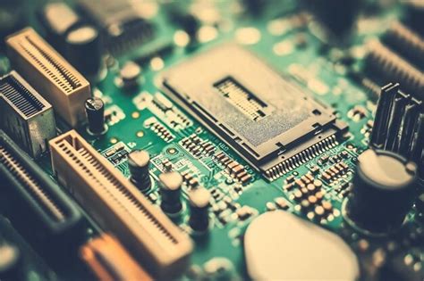 Closeup Of A Motherboard Showing Complex Electronic Components Premium Ai Generated Image