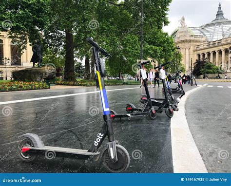Dott Mobility Logo On An Electric Scooter And Bicycles Editorial Photo