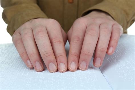 Premium Photo Blind Woman Read Book Written In Braille