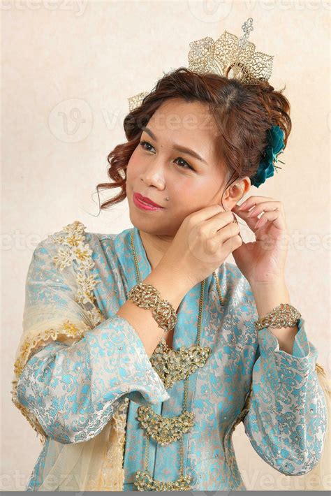 Beautiful Young Woman Wearing Mahsuri Style Baju Kebaya Labuh