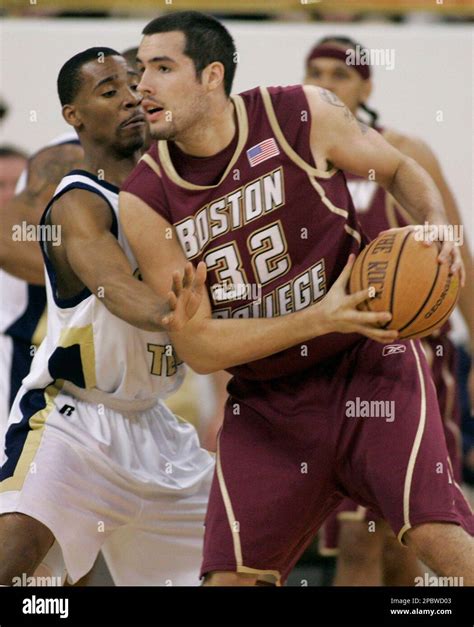 Boston College Forward John Oates 32 Keeps The Ball Away From Georgia