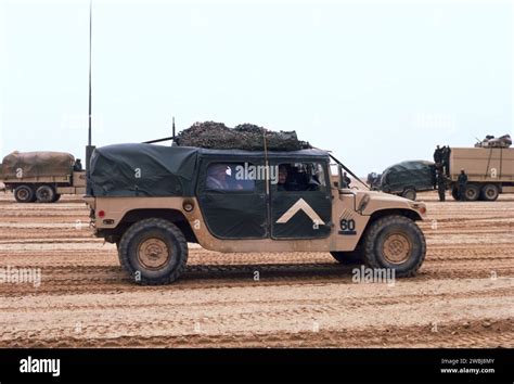 25th February 1991 A Us Army Humvee Advances Across The Desert In