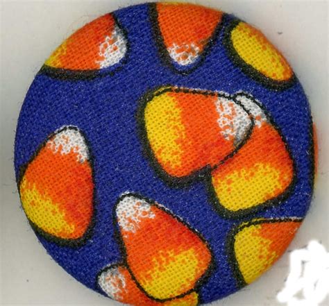Gorgeous Candy Corn Button For Halloween Deep Blue Background Fabric By Helen Darner Nbs Medium