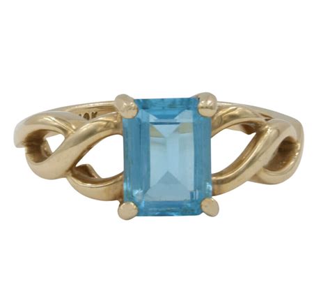 10 Karat Yellow Gold Emerald Cut Topaz Ring Lippas Jewelry