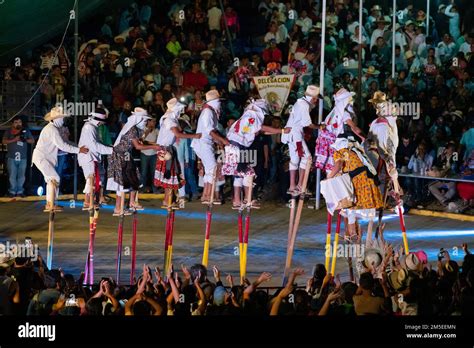 Zancudos De Zaachila Or Stilt Dancers Performing At A Guelaguetza Venue