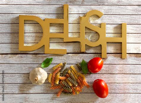 Gold Colored Word Art DELISH On Whitewashed Background With Tricolor