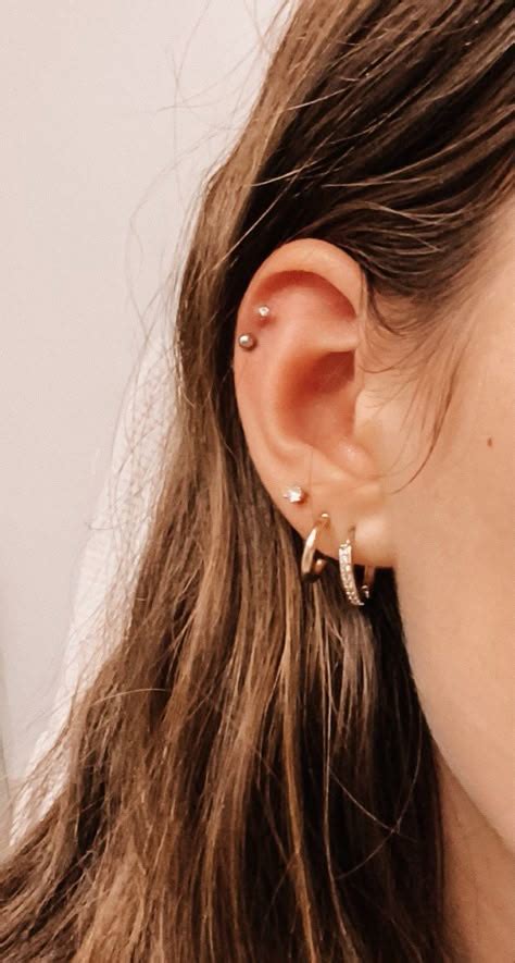 Three Lobe Piercings And Cartilage