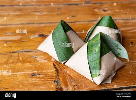 Simple Authentic Nasi Lemak Wrapped In Banana Leaf For Breakfast Stock