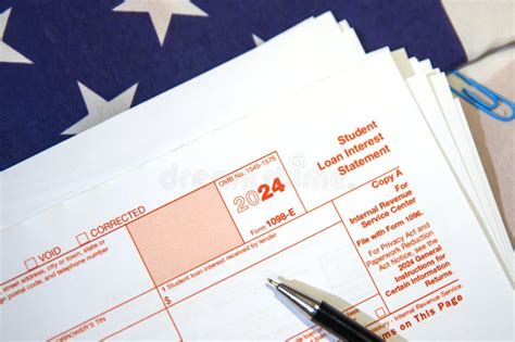Student Loan Interest Statement Form 1098 E With Pen On The Paper