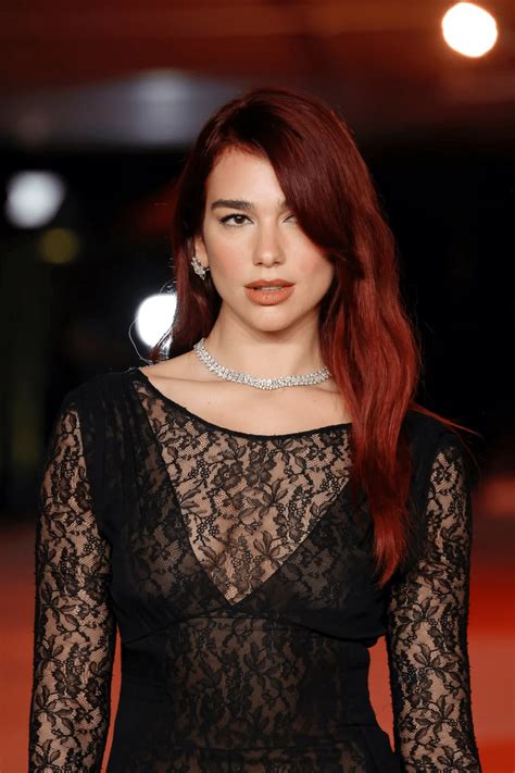 Dua Lipa Shows Off Thong And Embraces The Braless Look In Lacy Black Dress